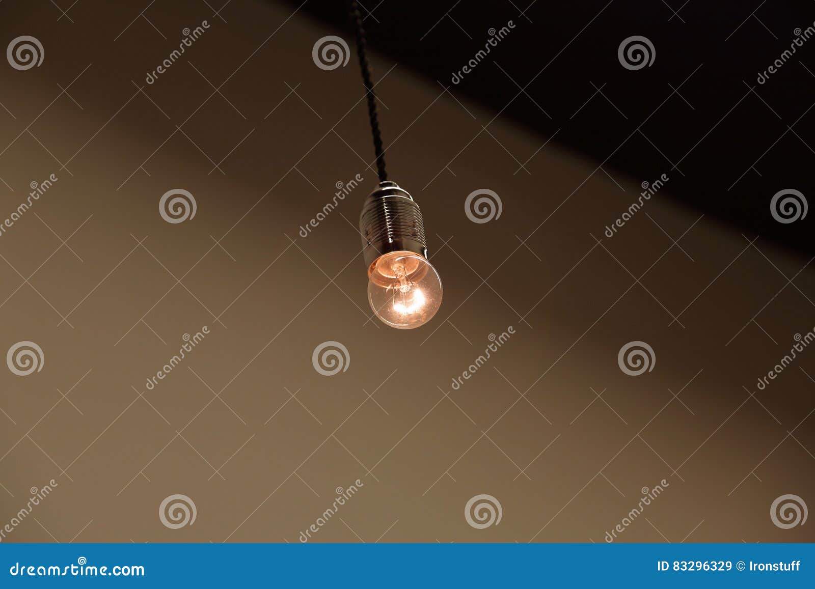 Bare bulb on a wire stock image. Image of interior, shadow - 83296329