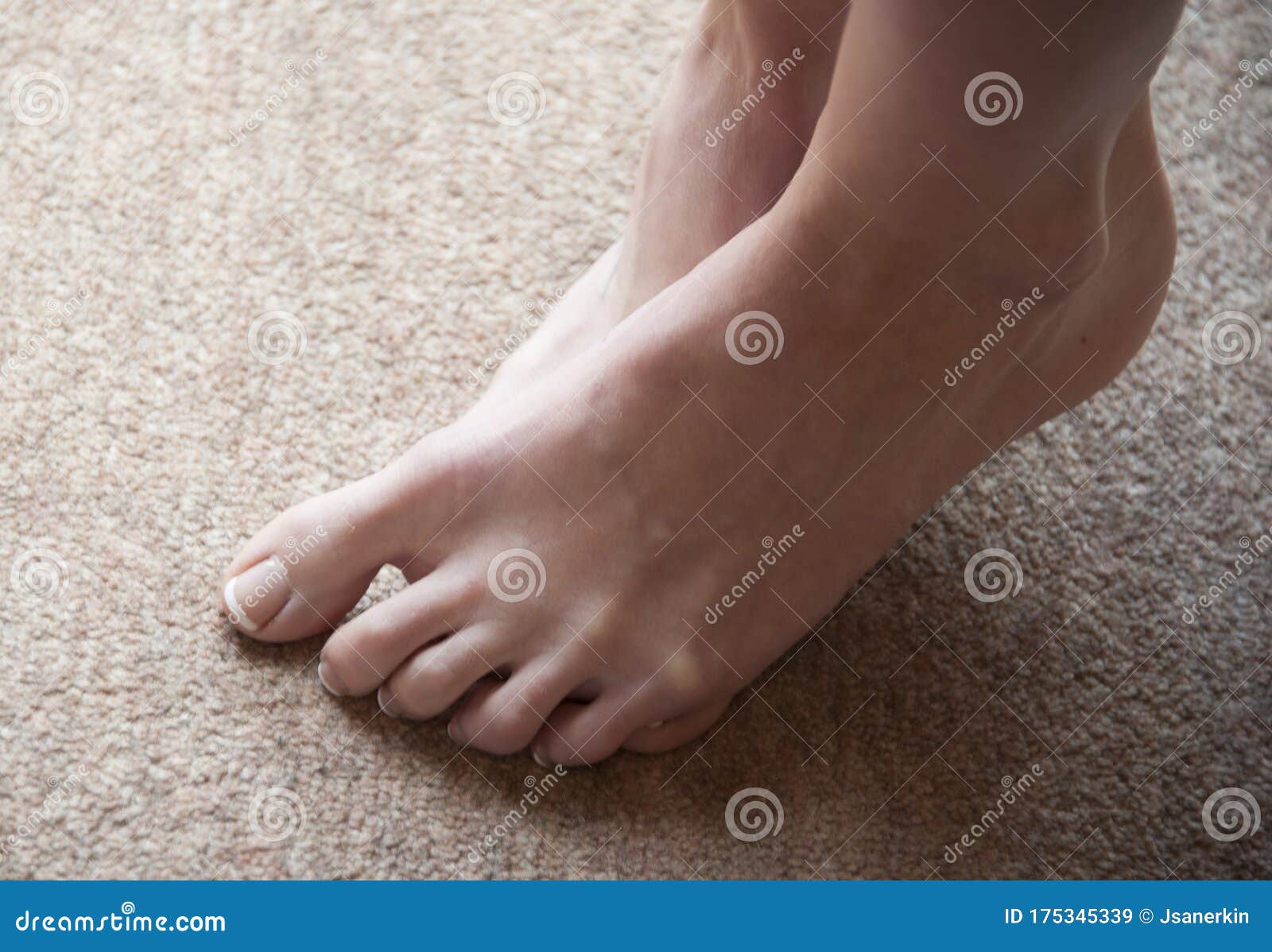 Bare feet on a carpet stock image. Image of baby, nail - 175345339