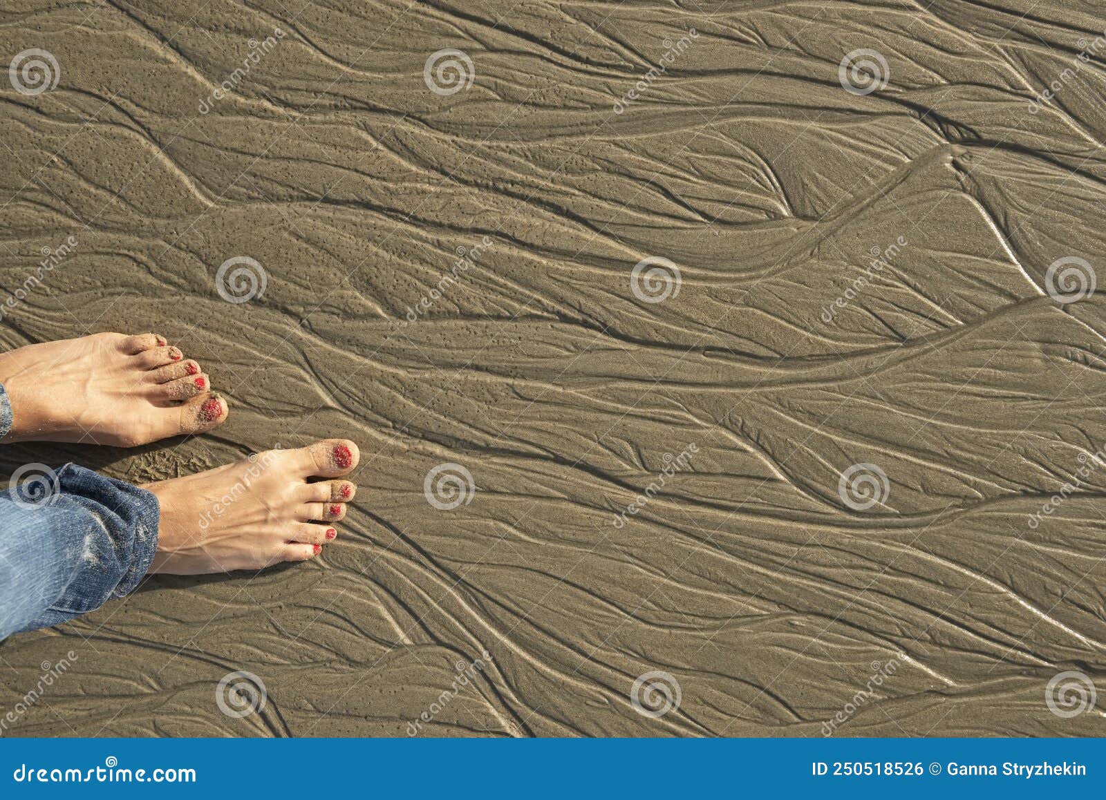 Bare Feet in the Sand on the Beach Sand. Patterns on the Sand from the ...