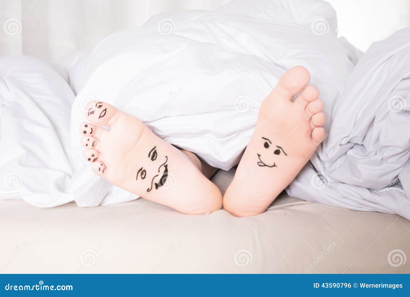 Bare Feet with Smiley Faces Stock Photo - Image of lying, smiling: 43590796
