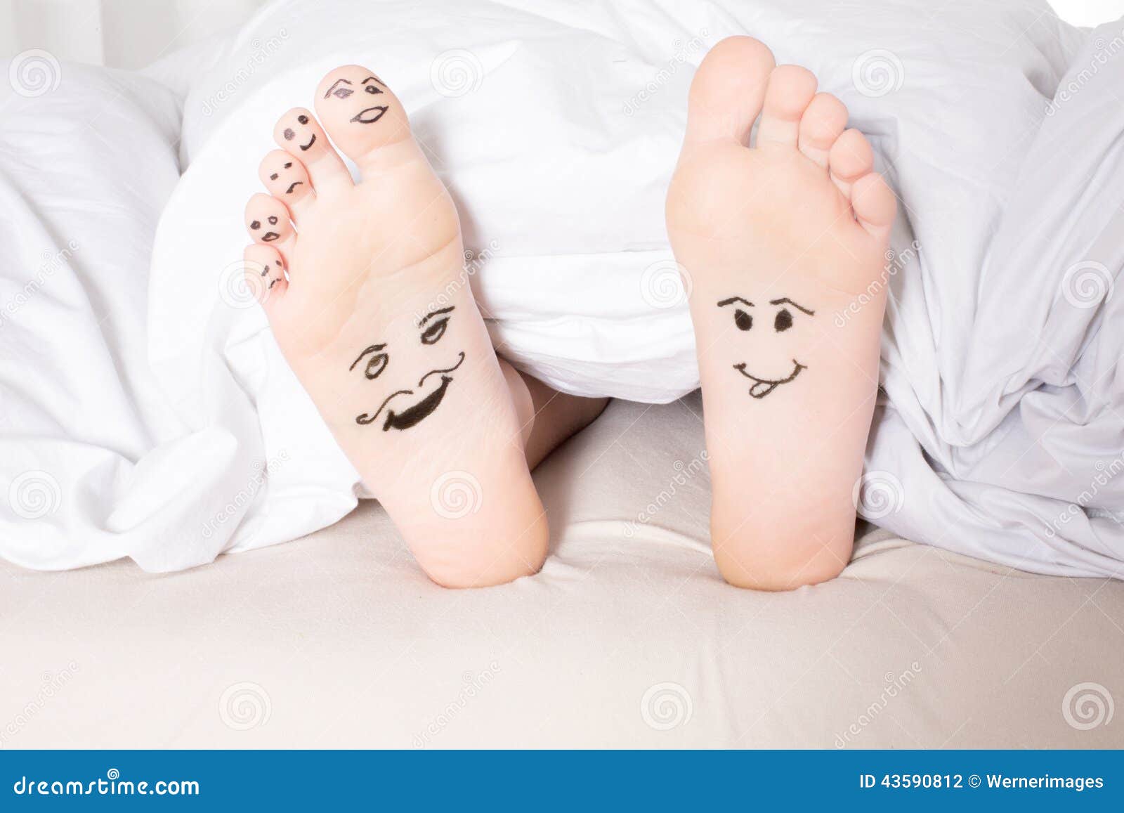 Bare Feet with Smiley Faces Stock Photo - Image of lying, indoor: 43590812