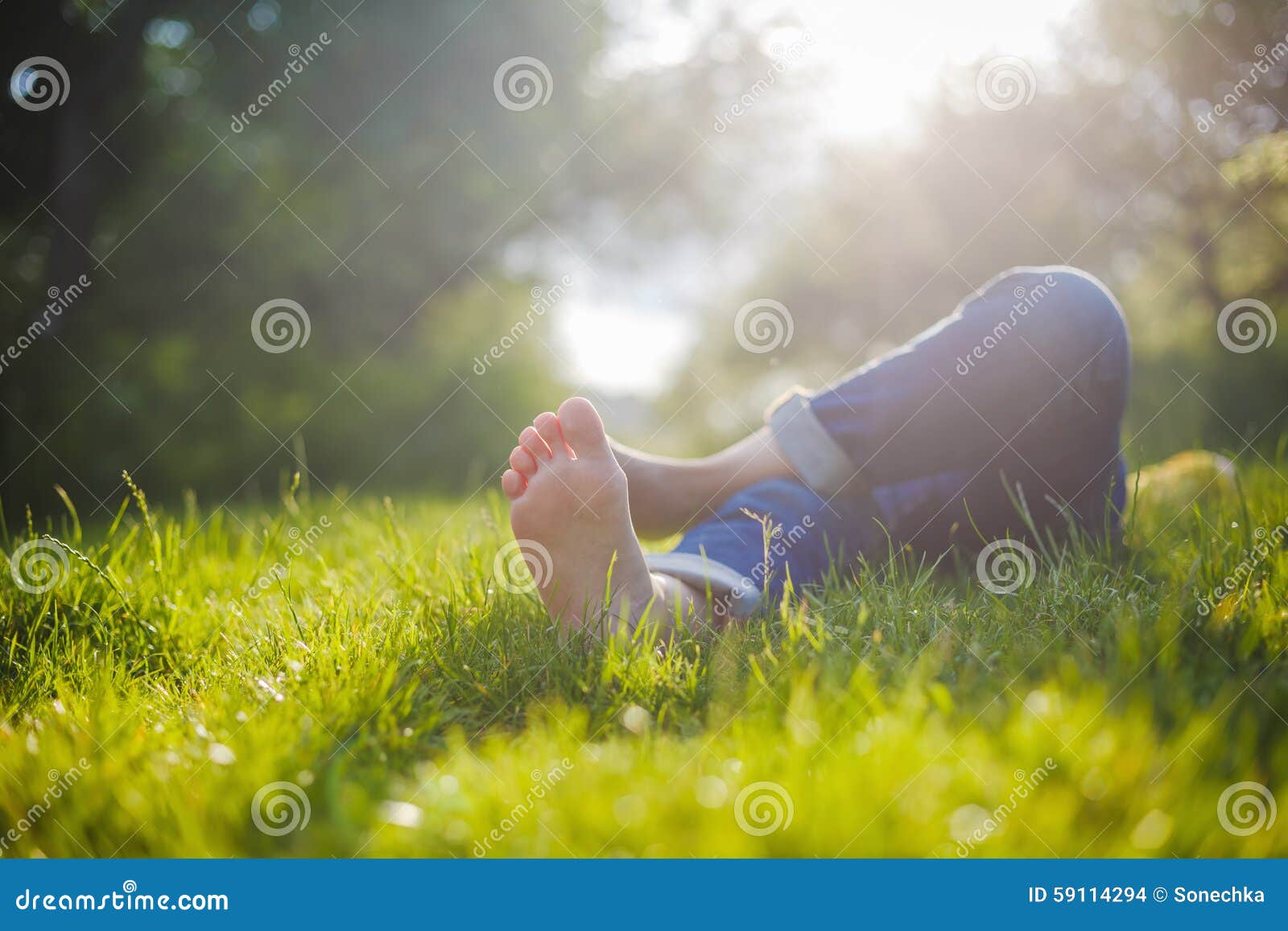 Bare feet on spring grass stock photo. Image of healthy - 59114294