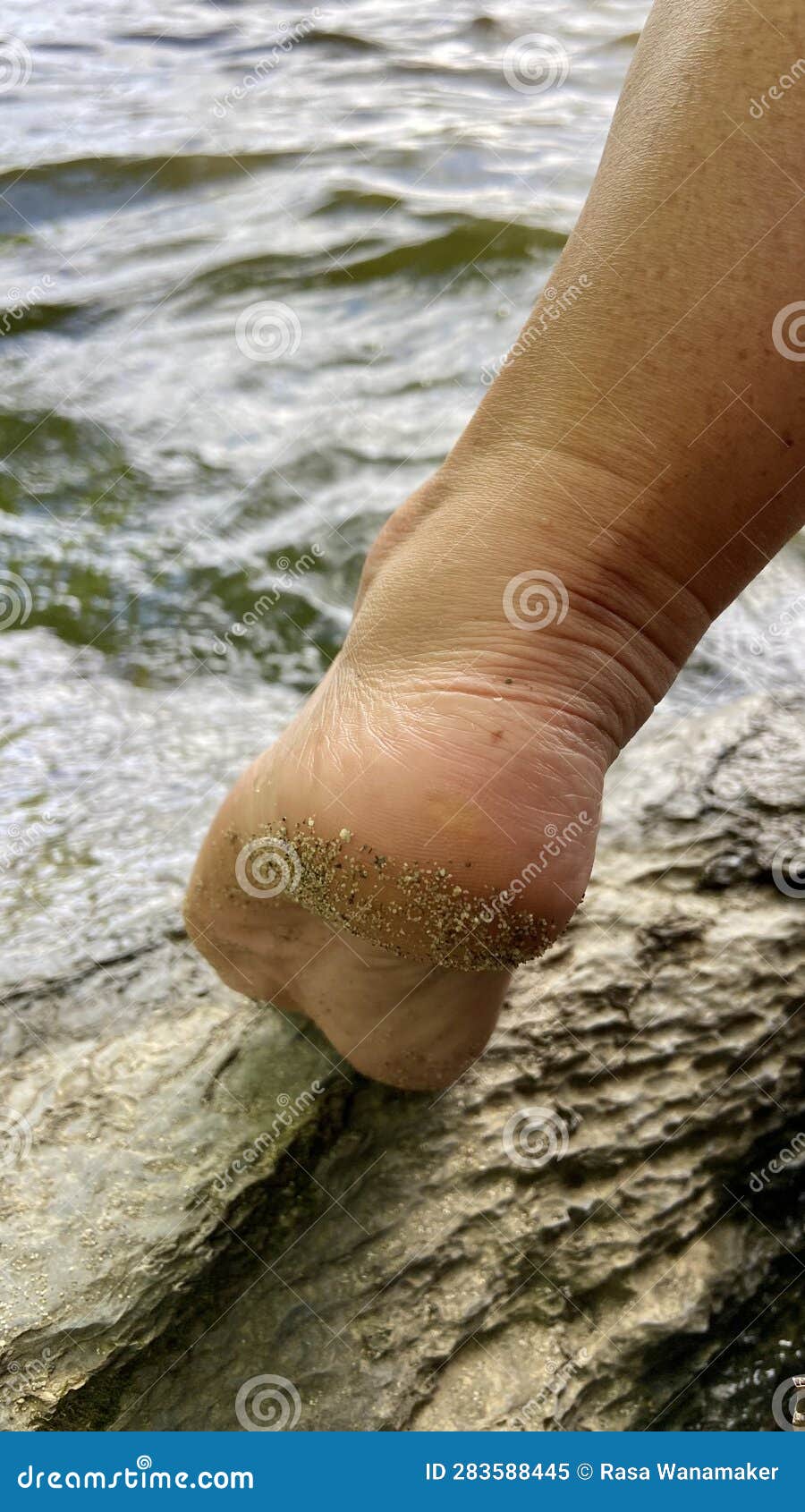 Bare foot on the rocks stock image. Image of skin, nature - 283588445
