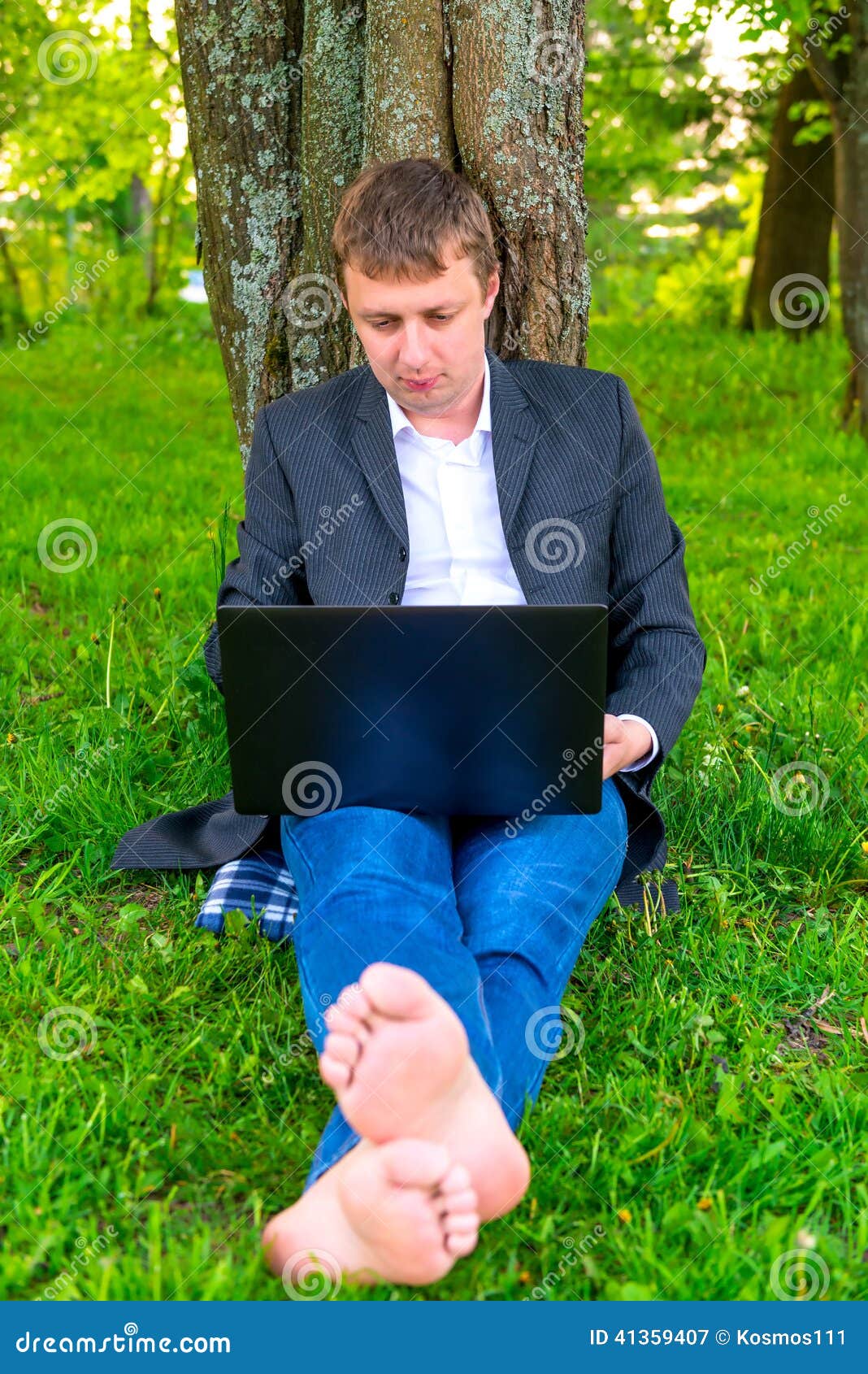 Barefoot Businessman with a Computer Stock Image - Image of finance ...