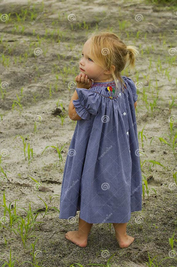 Barefoot child on field stock image. Image of field, rear - 9856867