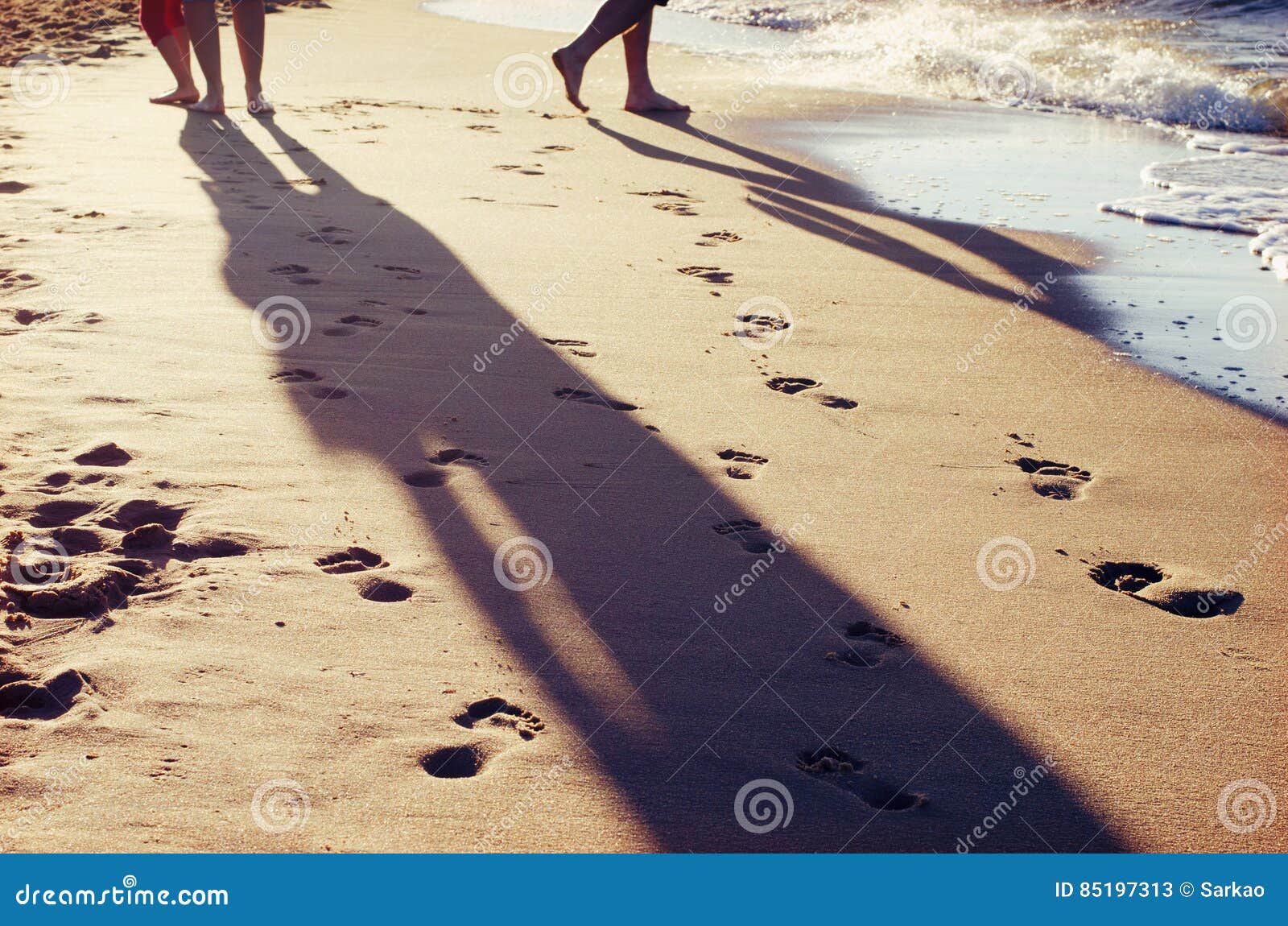 Barefoot people on a beach stock image. Image of poland - 85197313