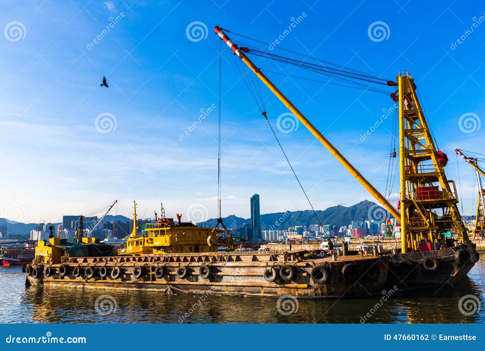 Barge dredging a harbor stock photo. Image of earth, kong - 47660162