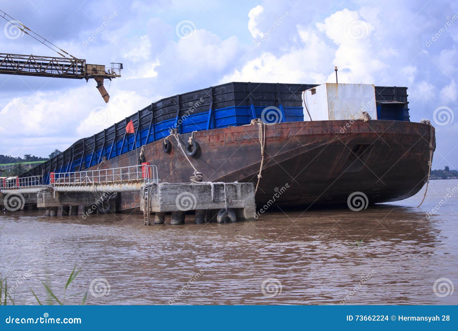 Barge at Jetty stock photo. Image of load, wire, matric - 73662224