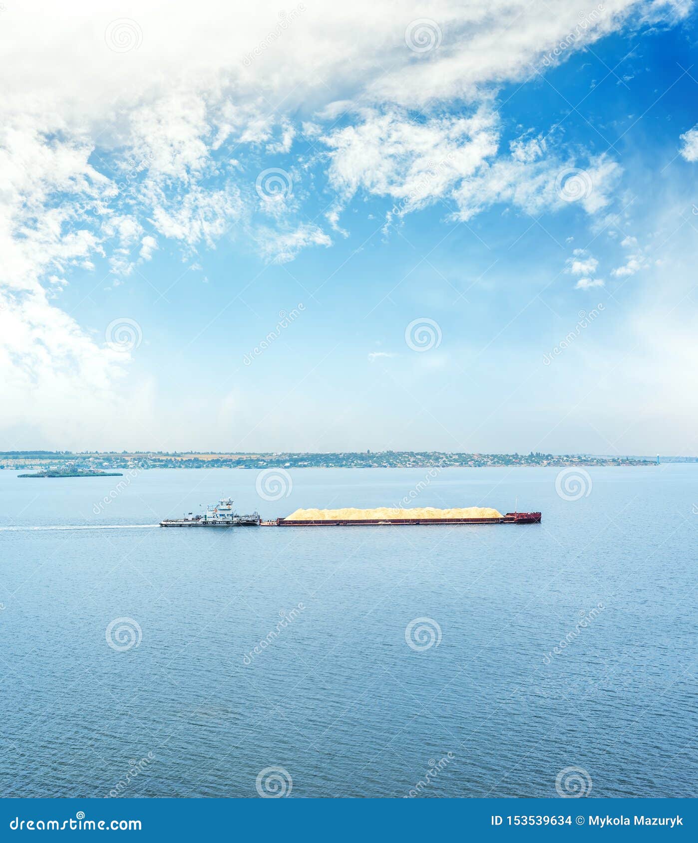 Barge Loaded with Sand on the River. Blue Sky with Clouds Over Big ...