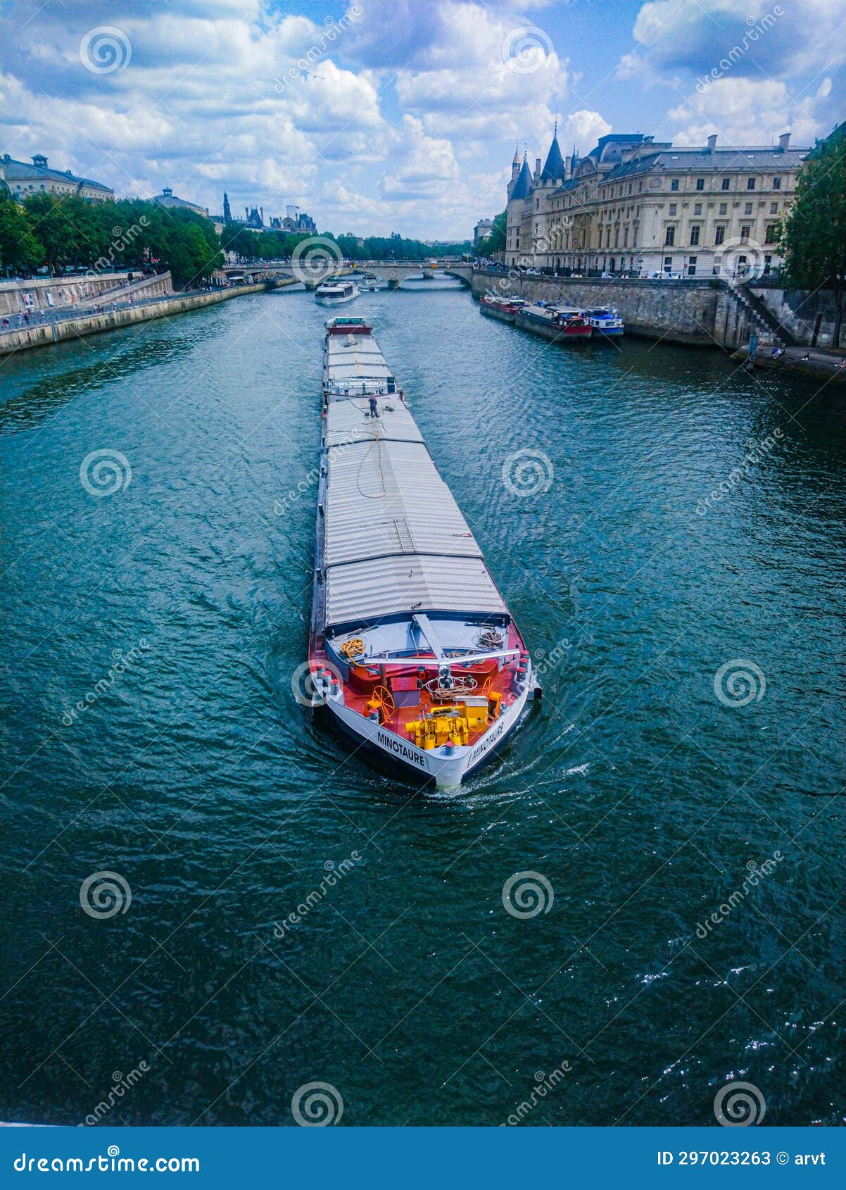 Barge Navigating the Seine in Paris Stock Image - Image of waterway ...