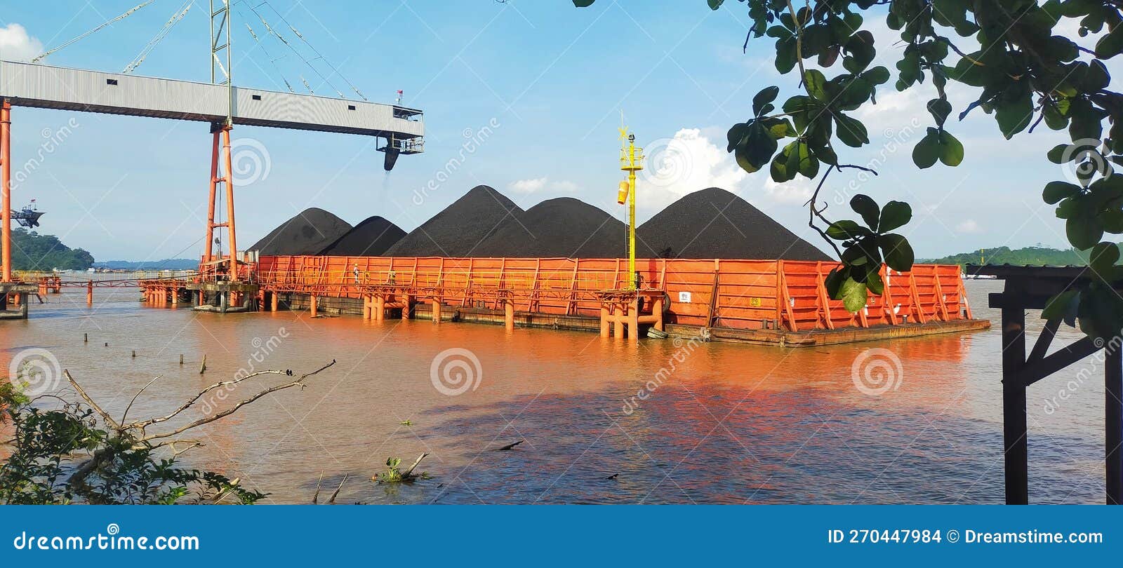 In the Middle of the Mahakam River in East Kalimantan, There is a Barge ...
