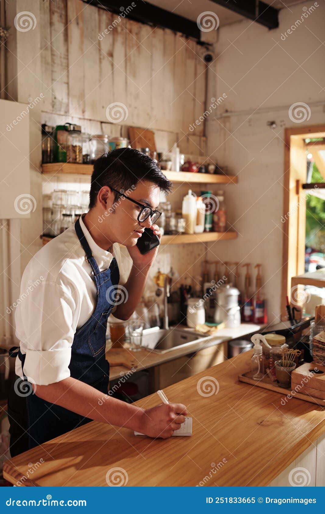 Barista Accepting Order stock image. Image of technology - 251833665