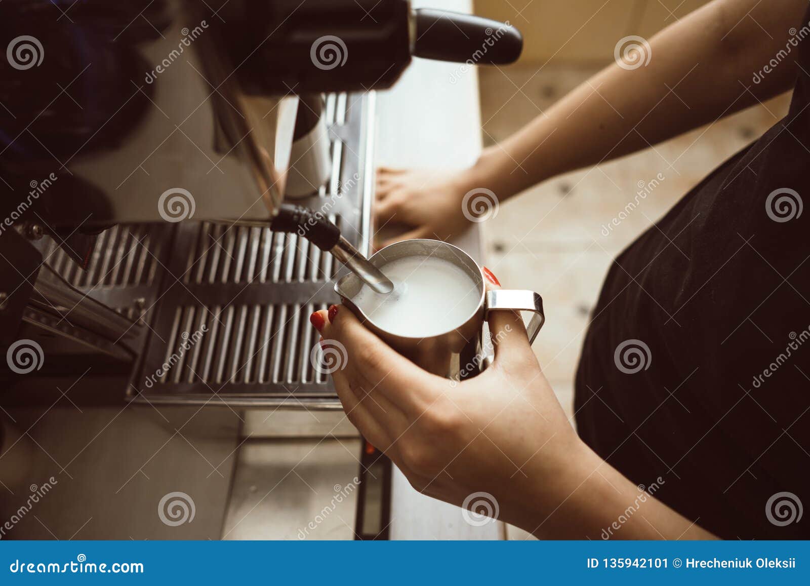 The Barista is Making Boiled Milk. he Uses Special Coffee Machine for ...