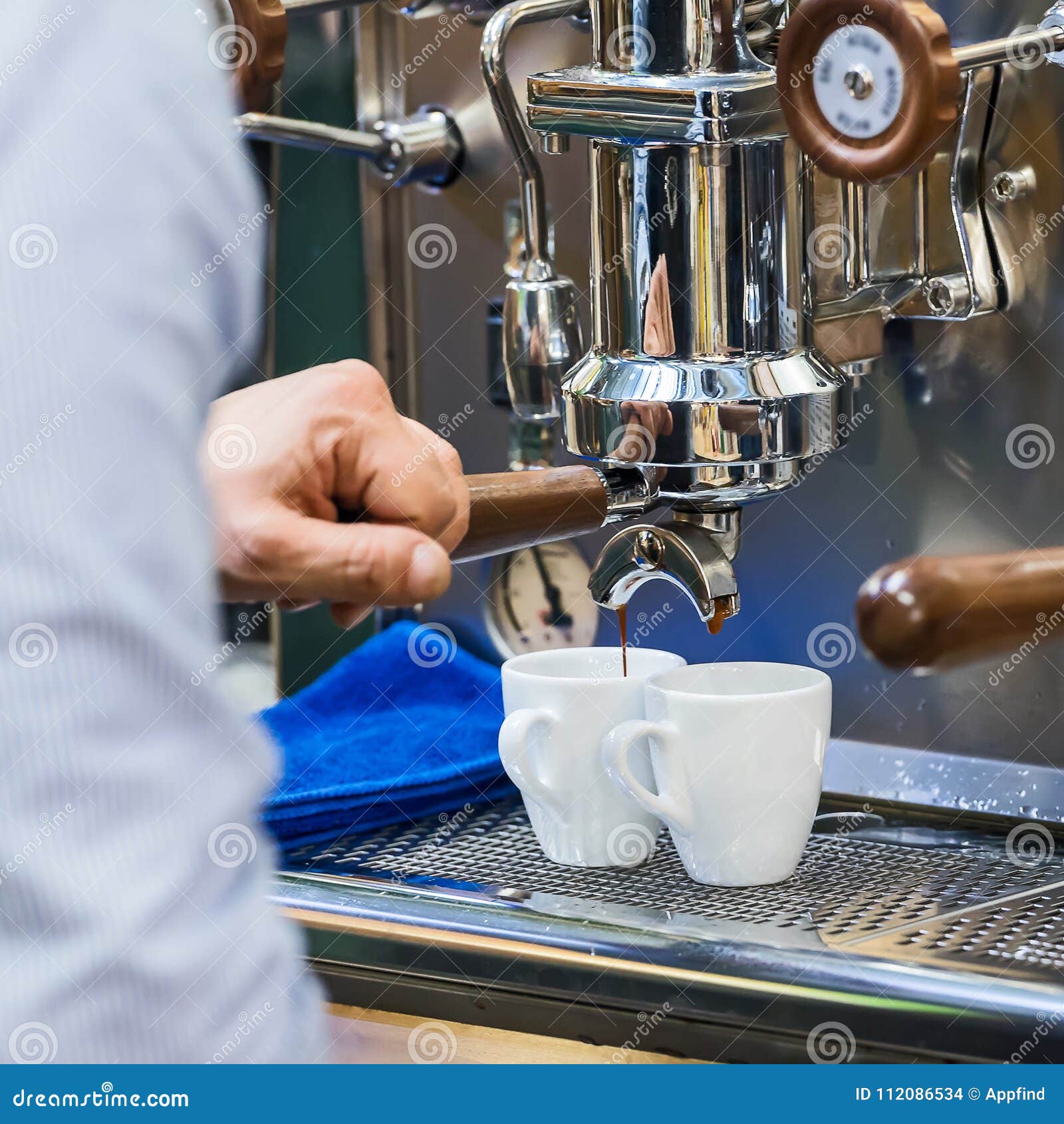 Barista is making coffee. stock photo. Image of holding - 112086534
