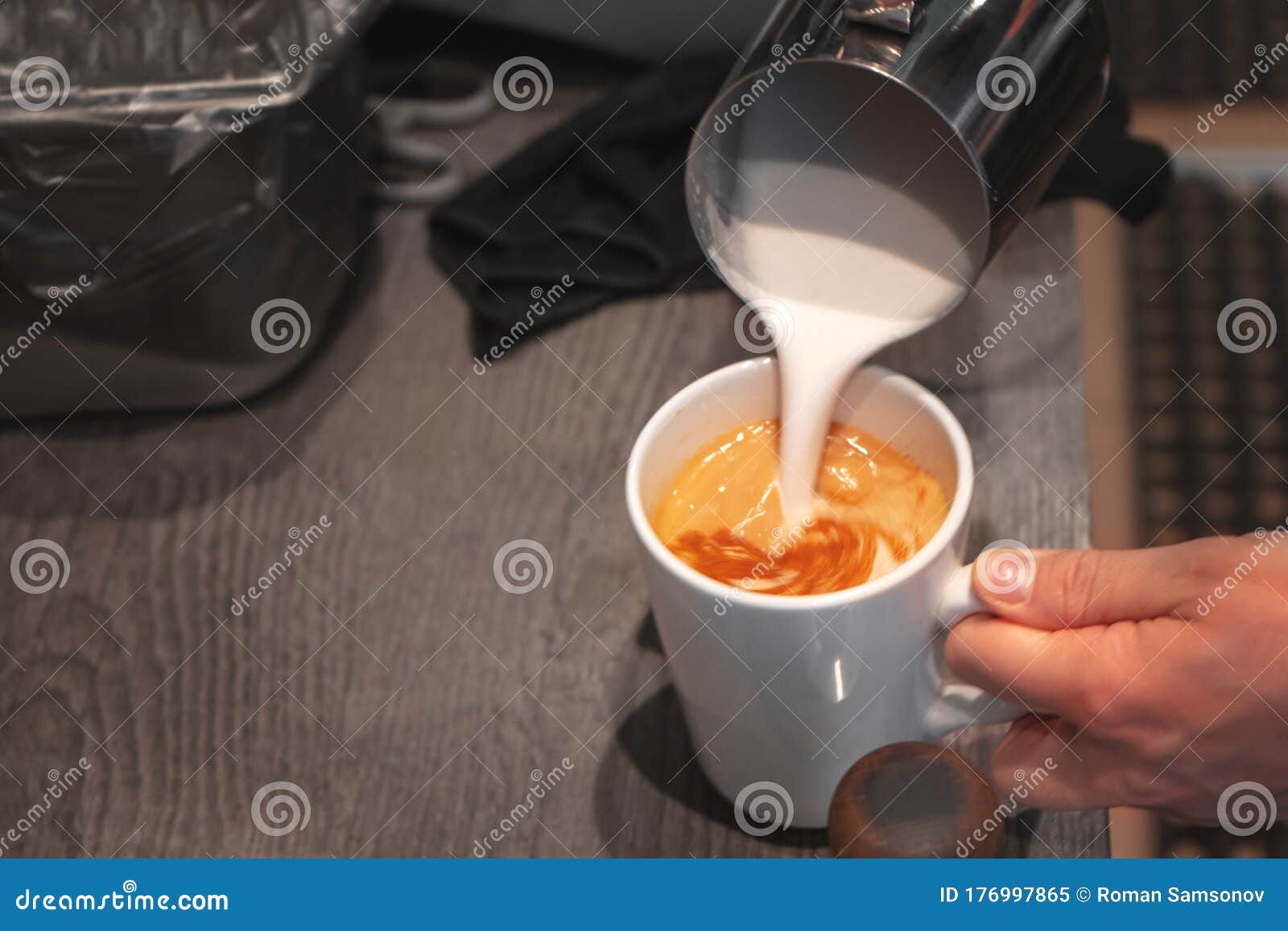 The Barista Pours Whipped Milk into a Coffee Mug Stock Image - Image of ...