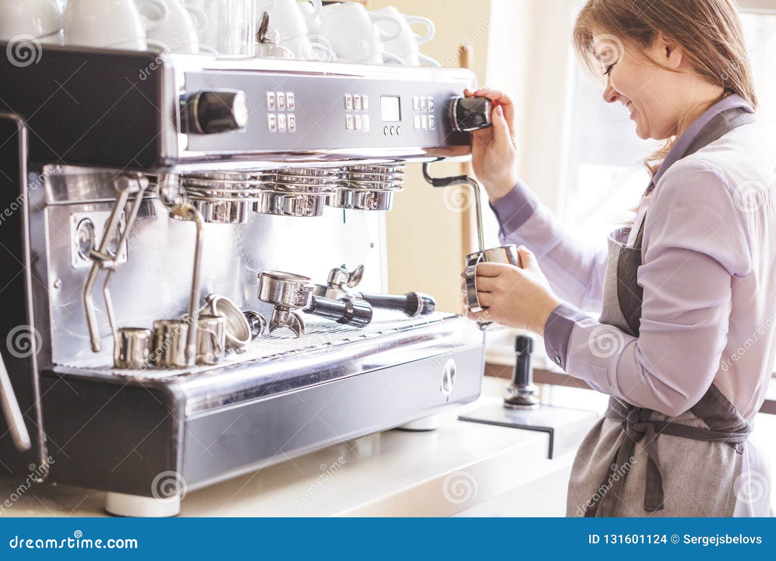 Barista Using Coffee Machine for Making Coffee in the Cafe Stock Photo ...