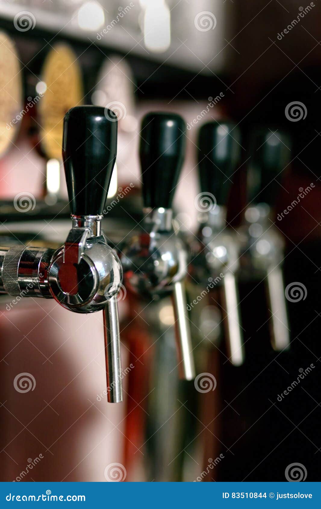 Barkeeper Pulling a Pint of Beer Stock Photo - Image of brew, lager ...
