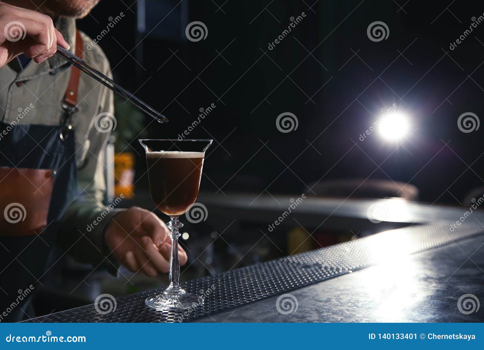 Barman Adding Coffee Bean To Martini Espresso Cocktail at Counter ...