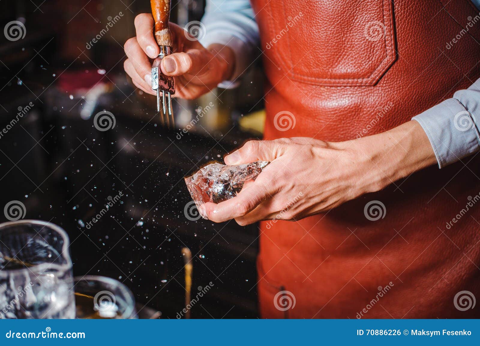 Barman Breaking Ice Behind Bar Stock Photo - Image of liquid, square ...