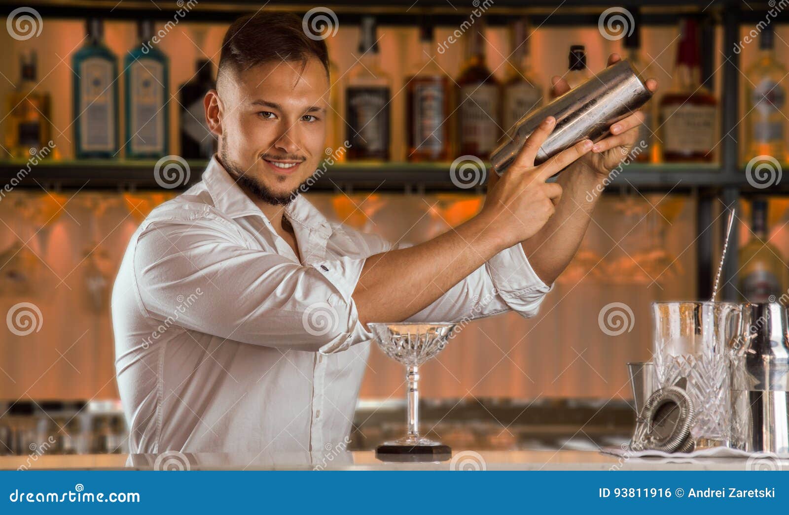Barman with a Charming Smile Prepares a Delicious Drink Stock Photo ...