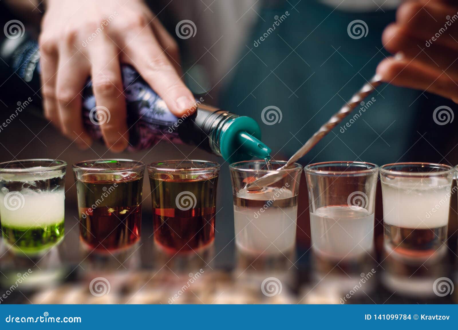 Barman Pouring Shots at a Bar Counter. Barman Hands Work Close Up Stock ...