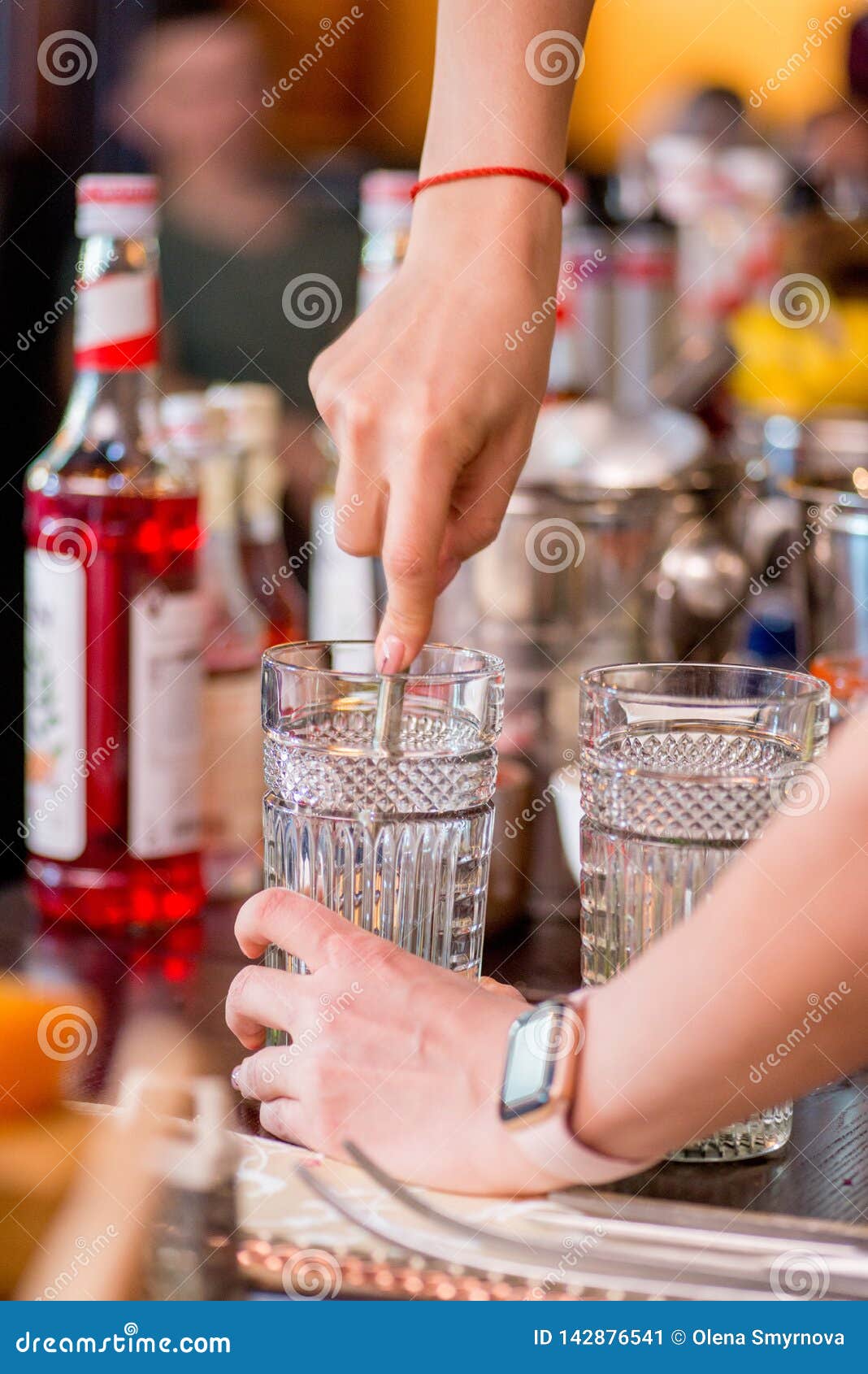 Barman preparing cocktail stock image. Image of bartending - 142876541