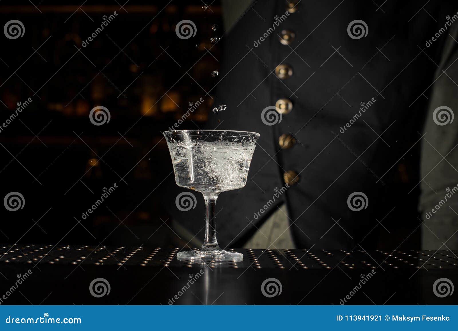 Barman Putting an Ice Cube with Splash into the Glass Stock Image ... Barman Putting an Ice Cube with Splash into the Glass Stock Image ...