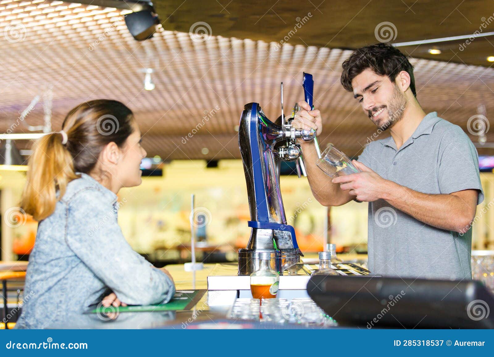 Barman Serving Beer for Young Female Customer Stock Image - Image of ...
