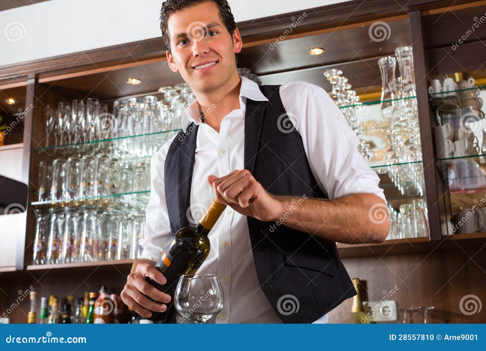 Barman Standing Behind Bar with Wine Stock Photo - Image of drinking ...