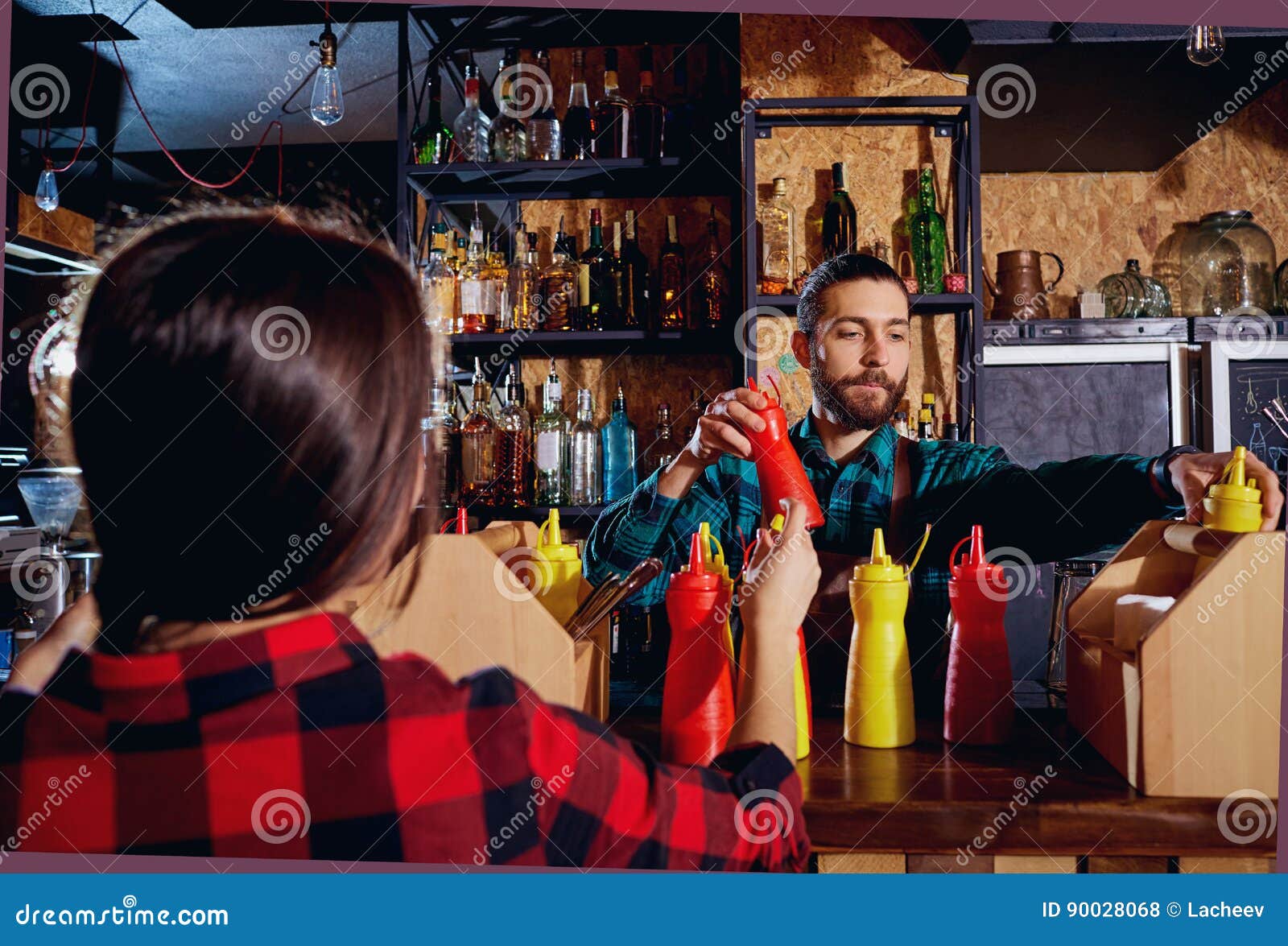 Barman and Waiter Work Together with the Team at the Bar Restau Stock ...