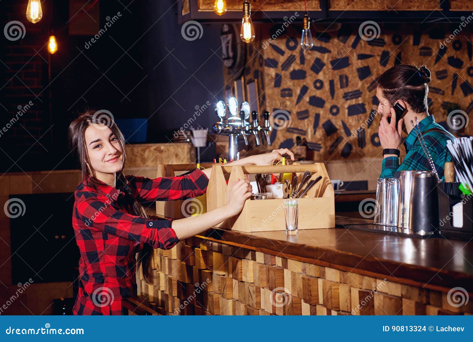 Barman and Waiter Work Together with the Team at the Bar Restau Stock ...