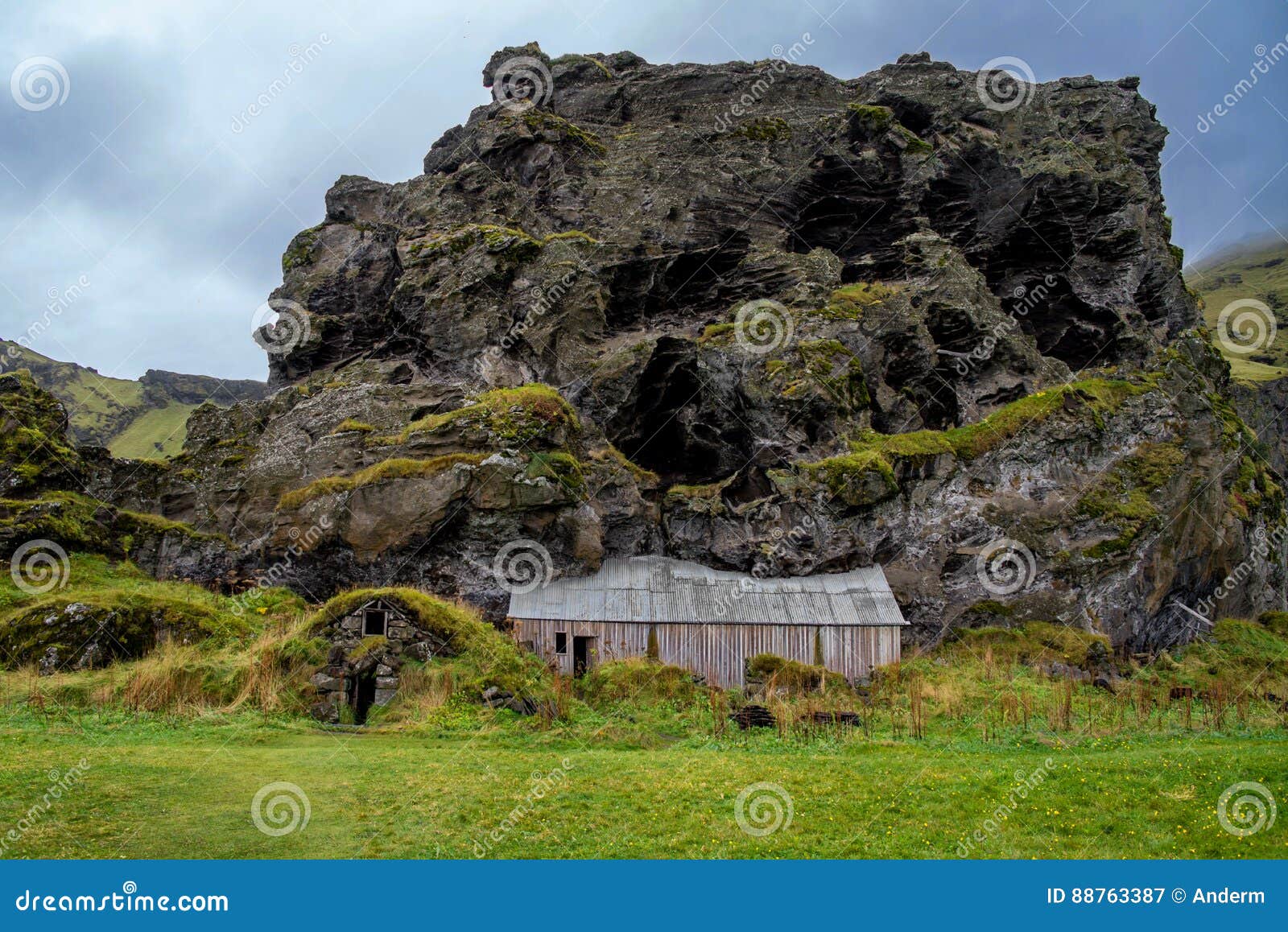 Barn built into a rock stock image. Image of country - 88763387