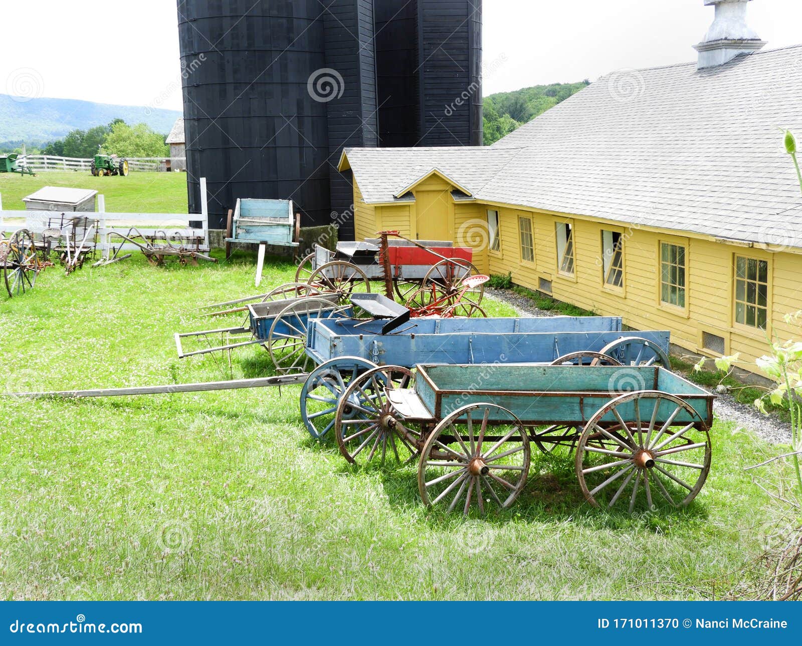 Shaker Barn Complex with Collection of Antique Wagons Stock Photo ...