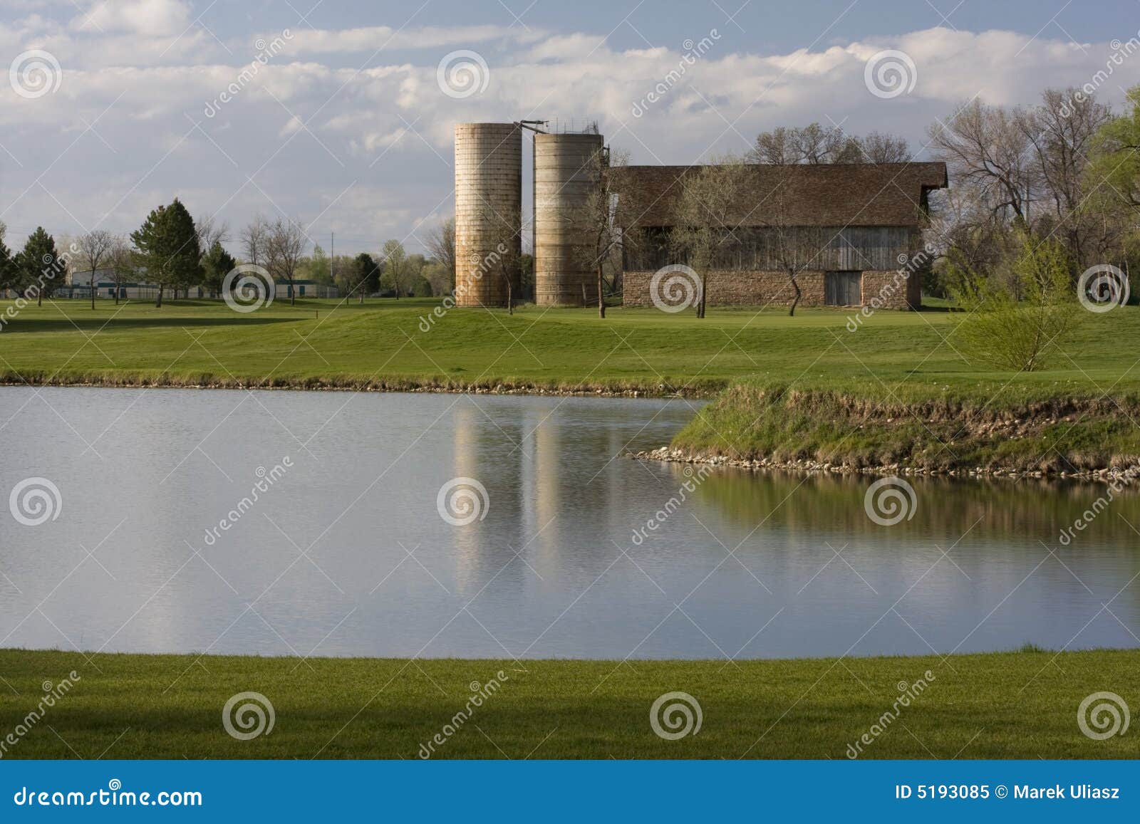 Barn with Two Silos Surrounded by Green Meadows an Stock Image - Image ...