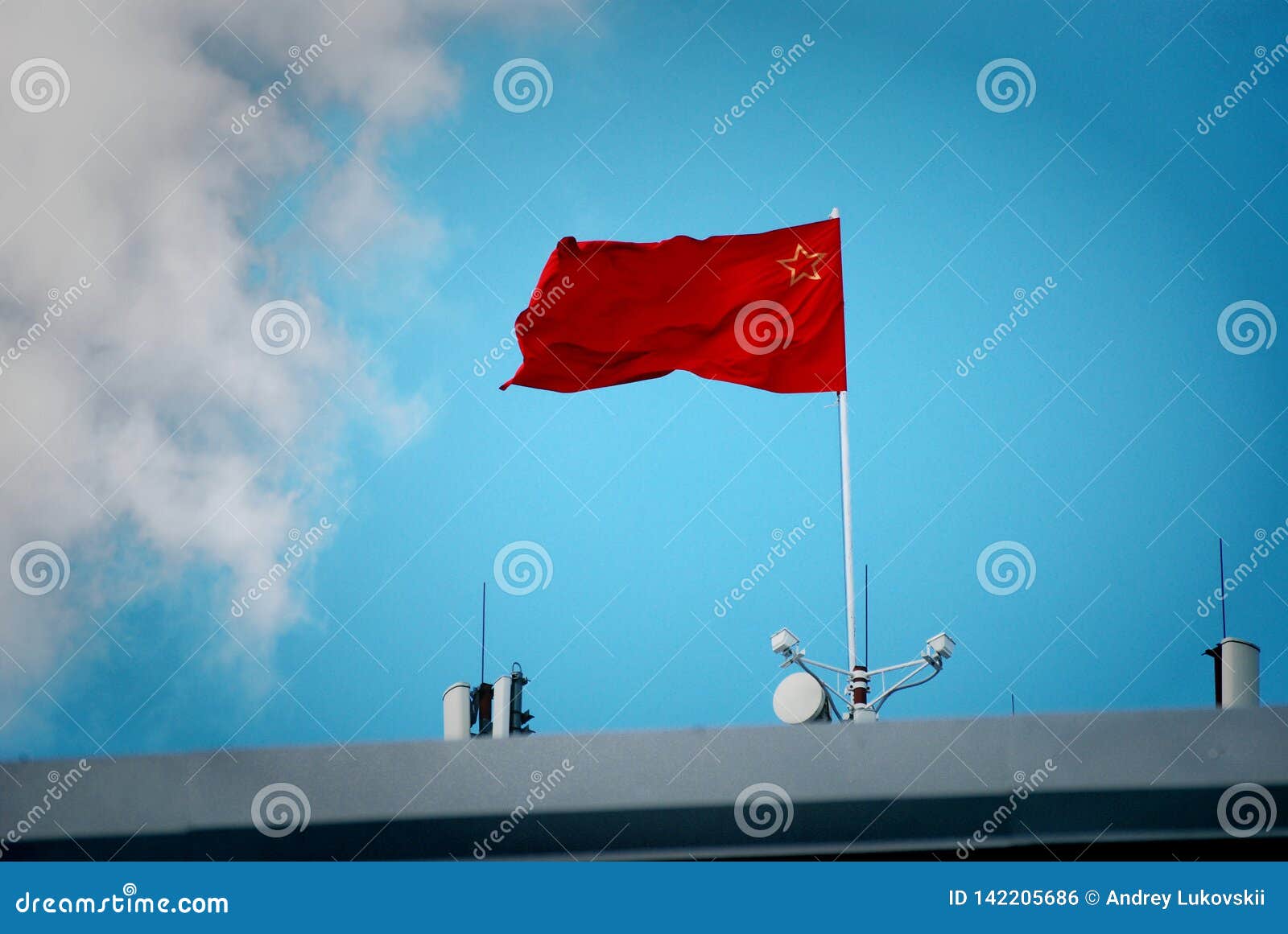 The Flag of the Soviet Union is Developing Against the Blue Sky Stock ...