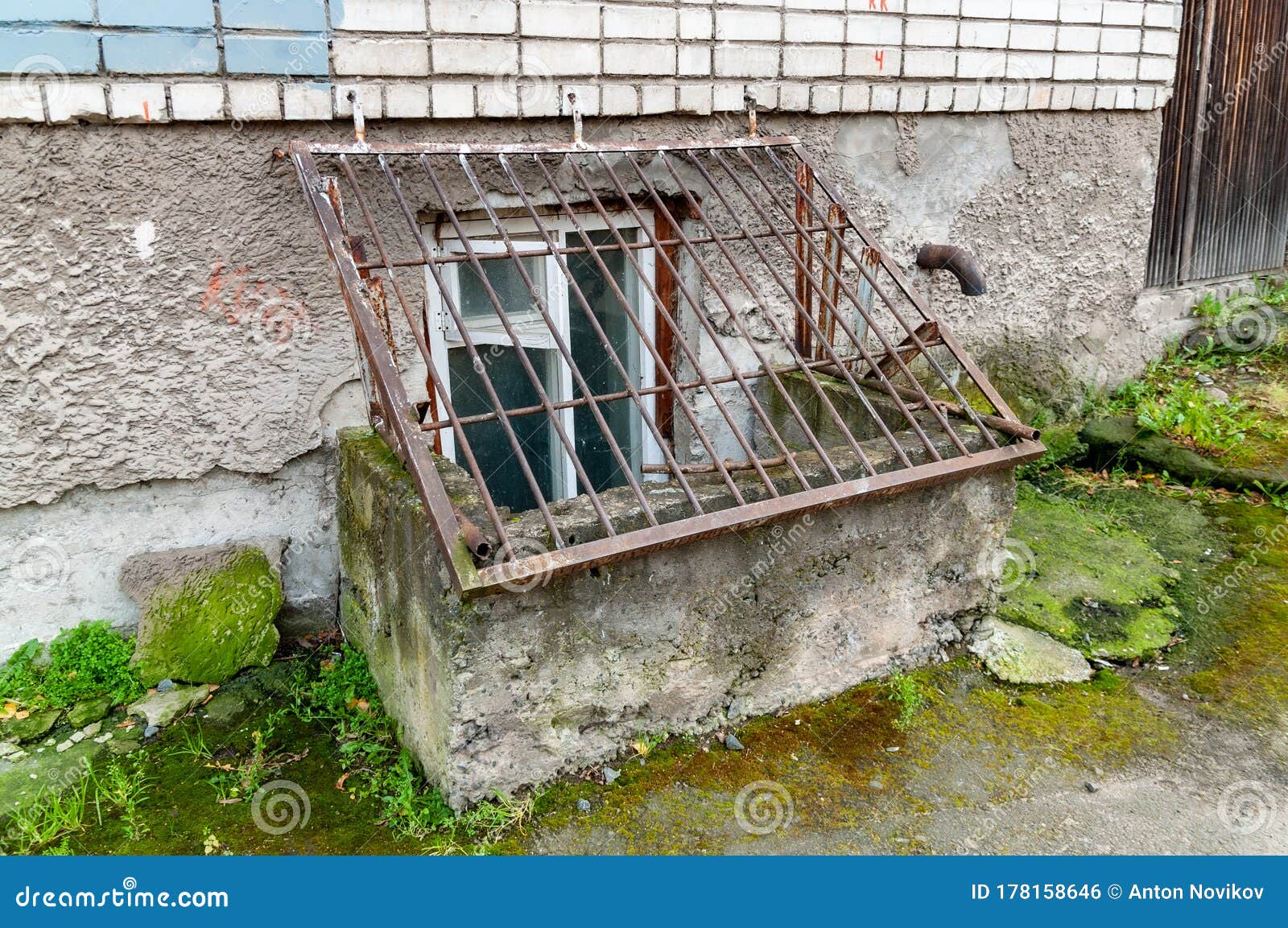 Barred basement window stock photo. Image of grate, metal - 178158646