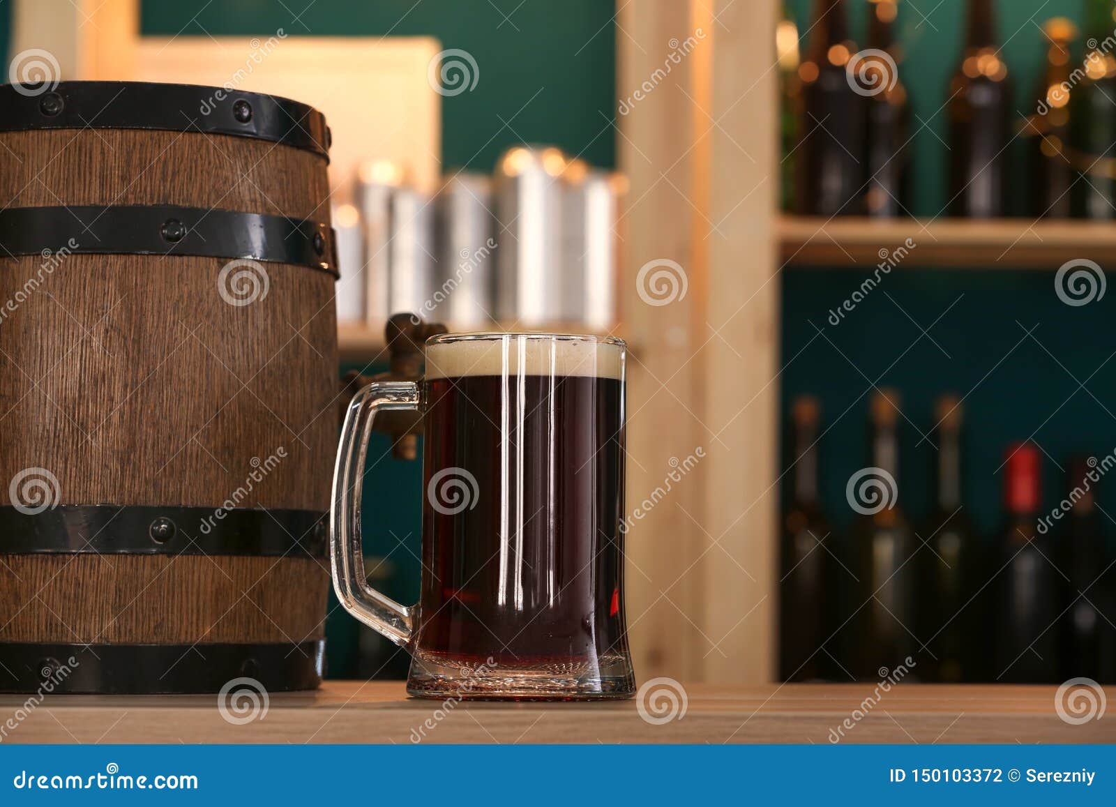Barrel and Glass of Beer on Table in Bar Stock Photo - Image of party ...