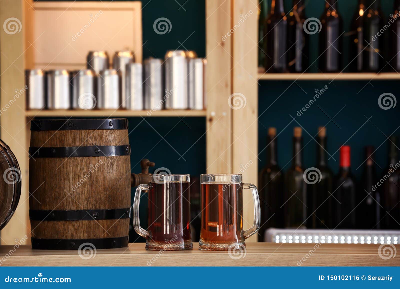 Barrel and Glasses of Beer on Table in Bar Stock Photo - Image of ...