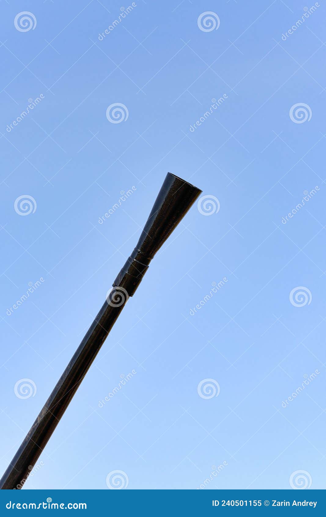 Barrel of a Machine Gun in a Diagonal Frame Against a Blue Sky Stock ...