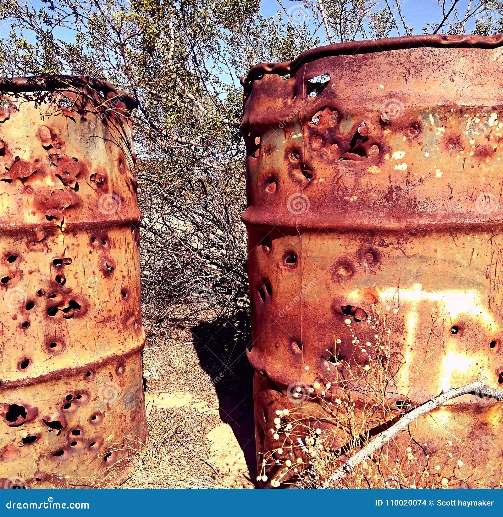 Barrels stock photo. Image of holes, barrels, rusty - 110020074