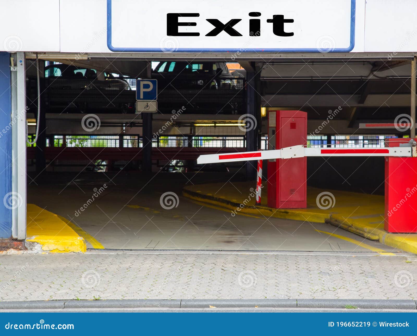 Barrier at the Exit of a Car Parking Garage with Sign Exit Stock Image ...