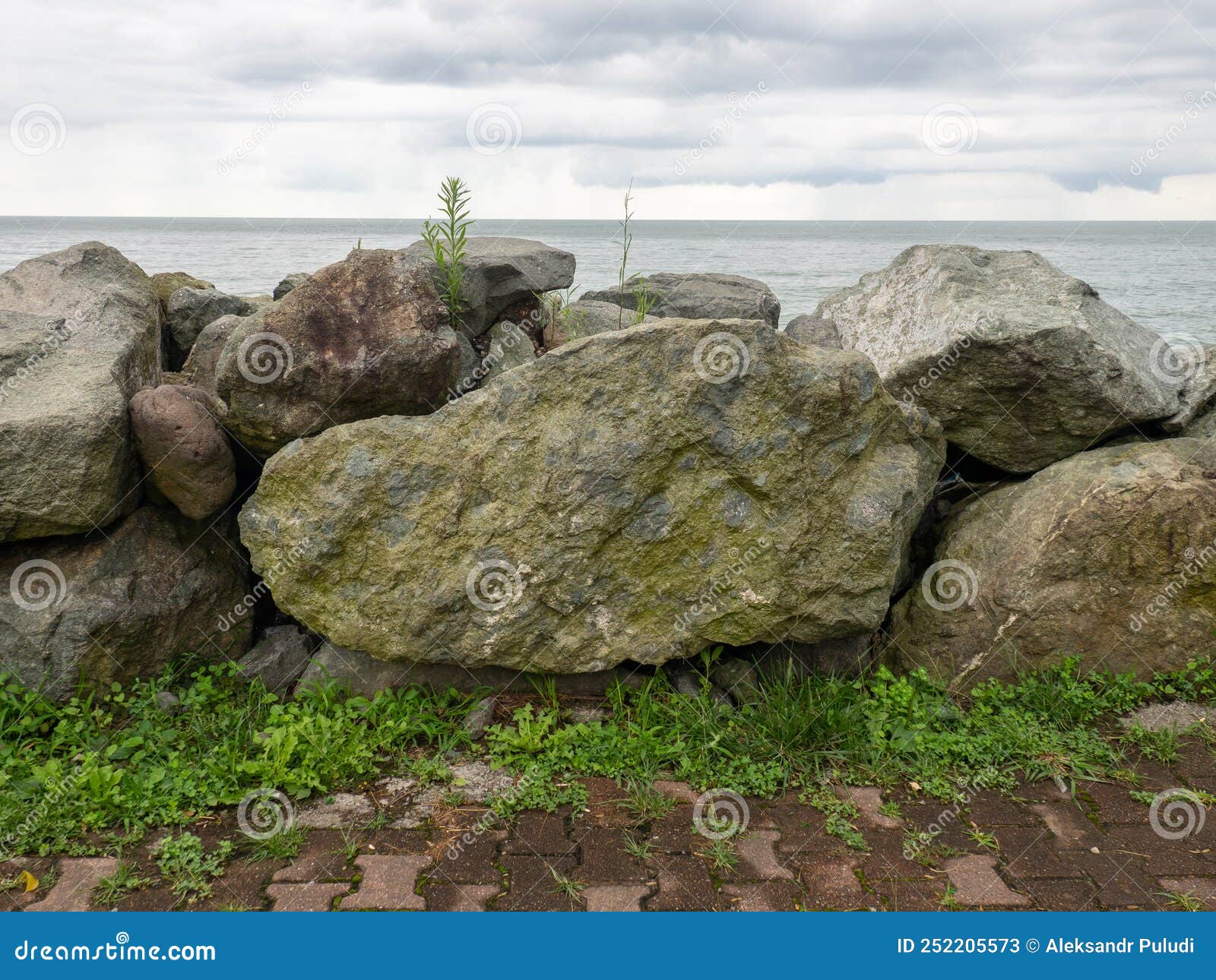 Barrier of Large Stones on the Seashore. Wave Protection. Irregular ...