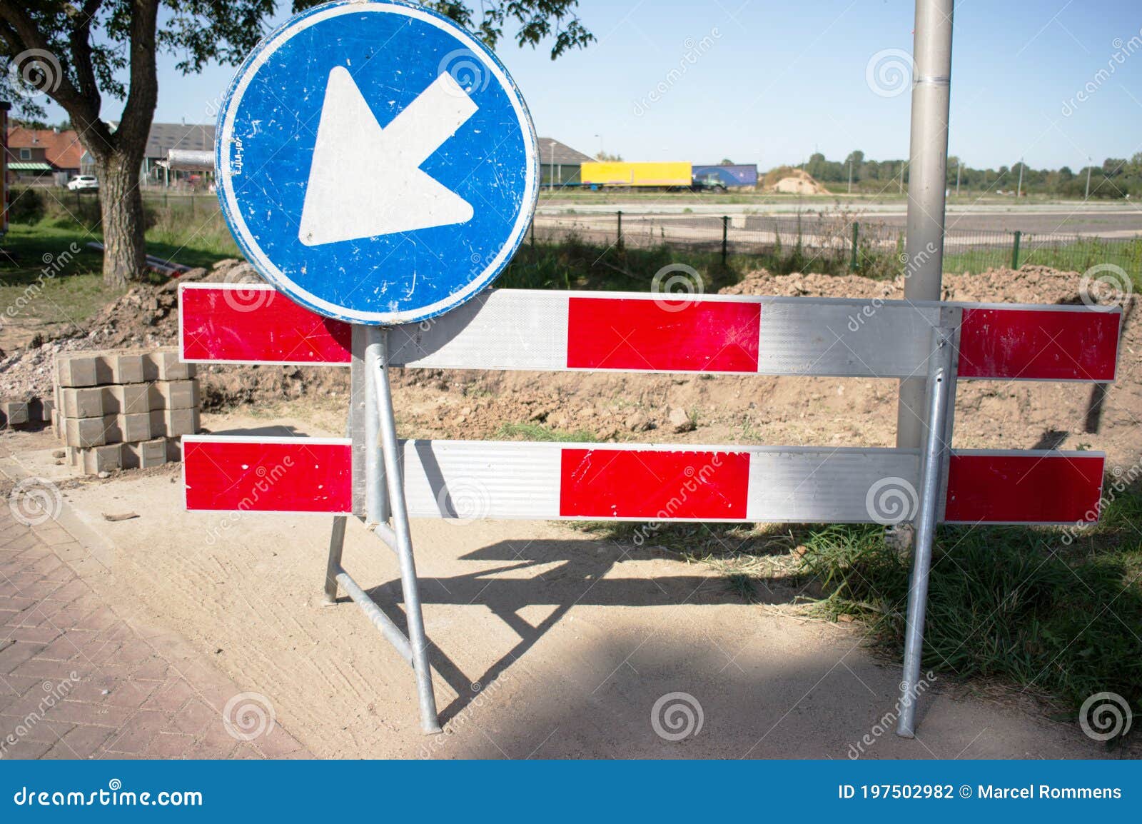 Barriers with Blue Arrow Sign Stock Photo - Image of closed, holland ...