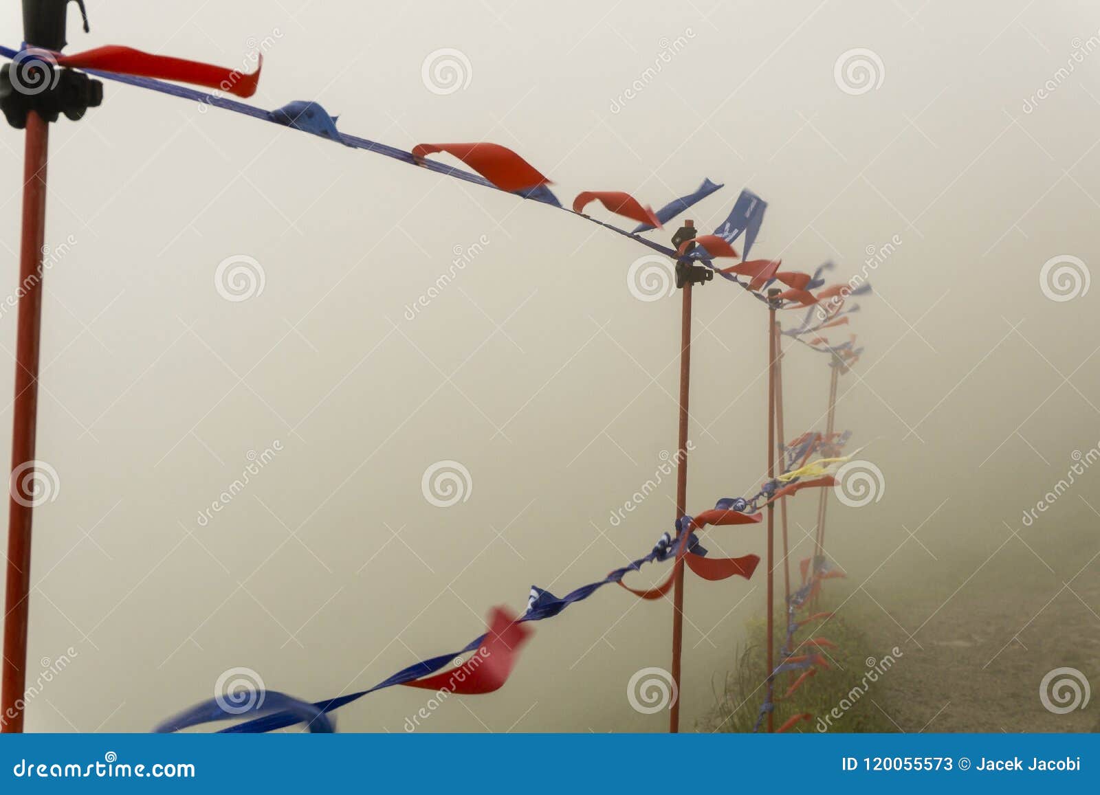 Barriers with Flags in a Strong Wind. Stock Image - Image of color ...