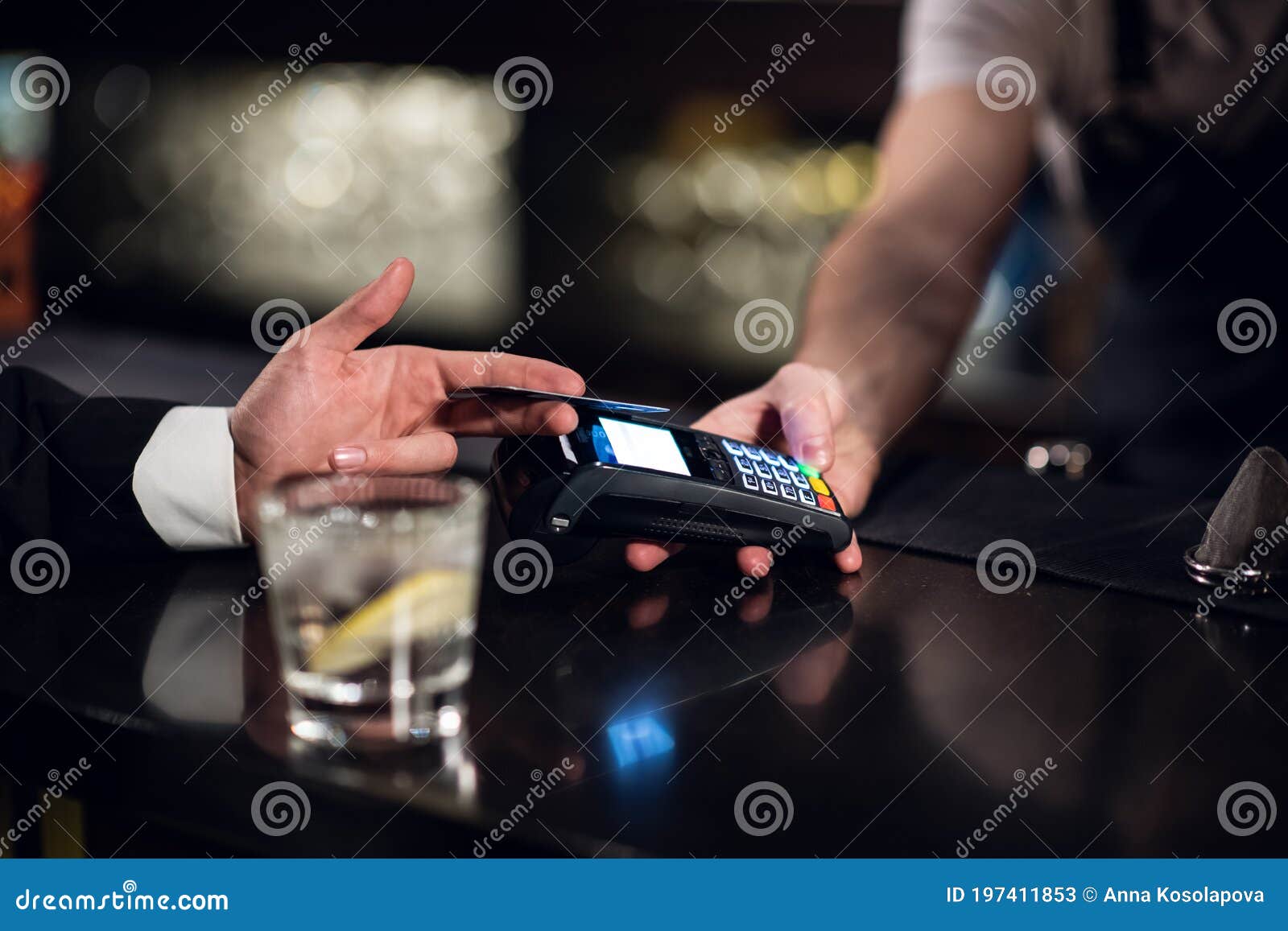The Bartender Accepts Payment by Credit Card at the Bar Stock Image ...