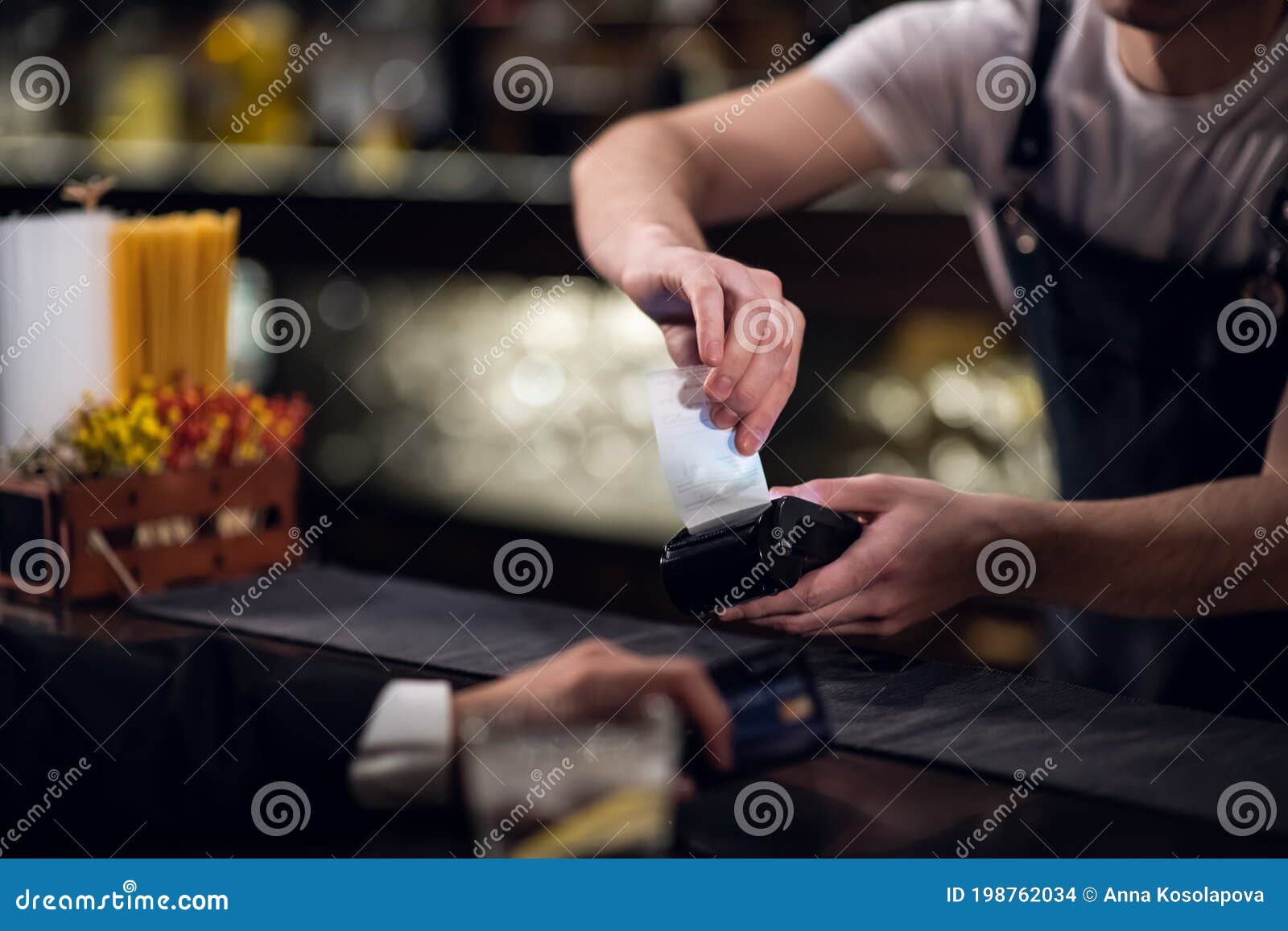 The Bartender Accepts Payment by Credit Card at the Bar Stock Photo ...