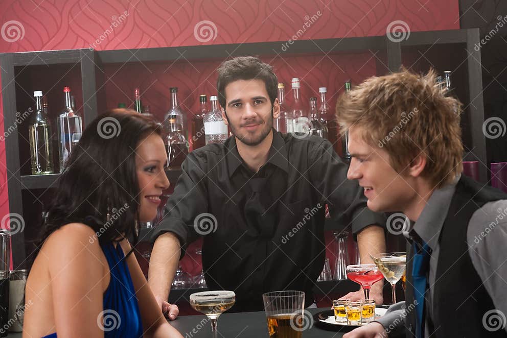 Bartender Behind the Bar Friends Having Drink Stock Photo - Image of ...