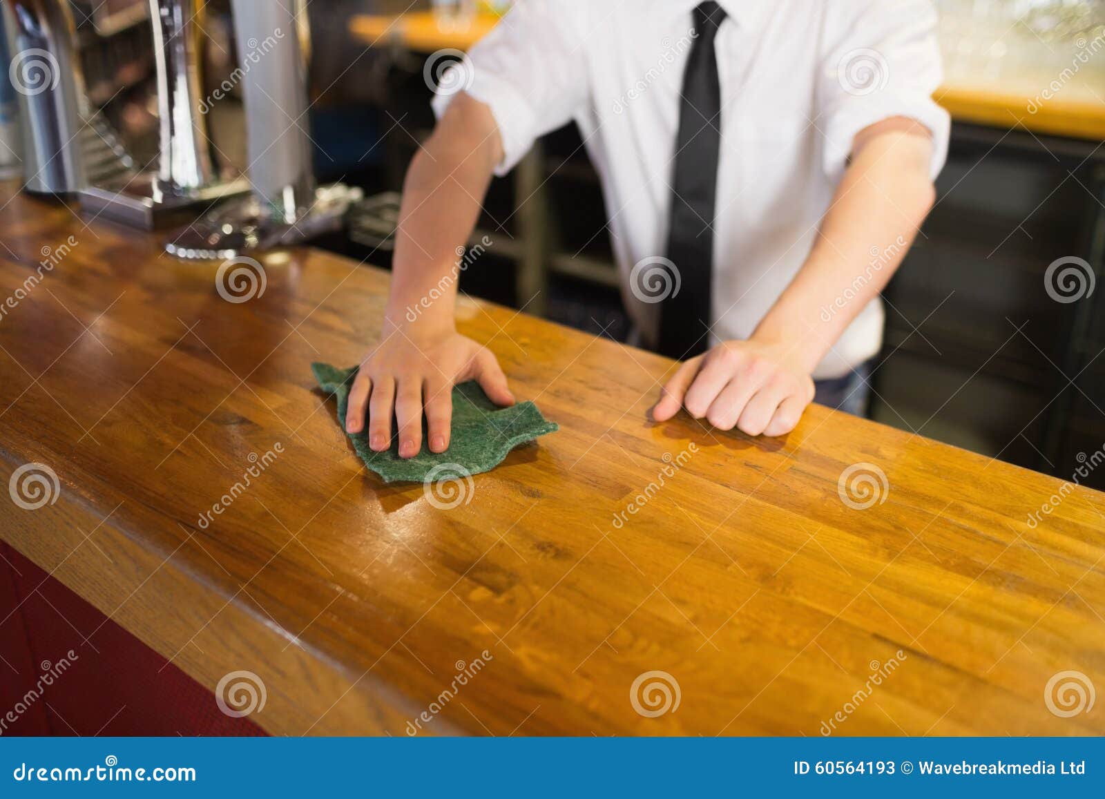 Bartender Cleaning Bar Counter Stock Image - Image of focus, caucasian ...
