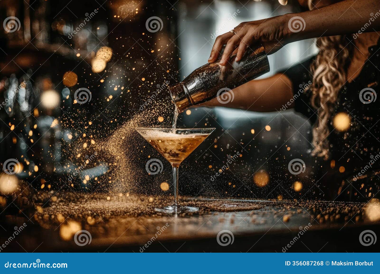 A Bartender Creating a Cocktail by Using a Strainer To Pour the Alcohol ...