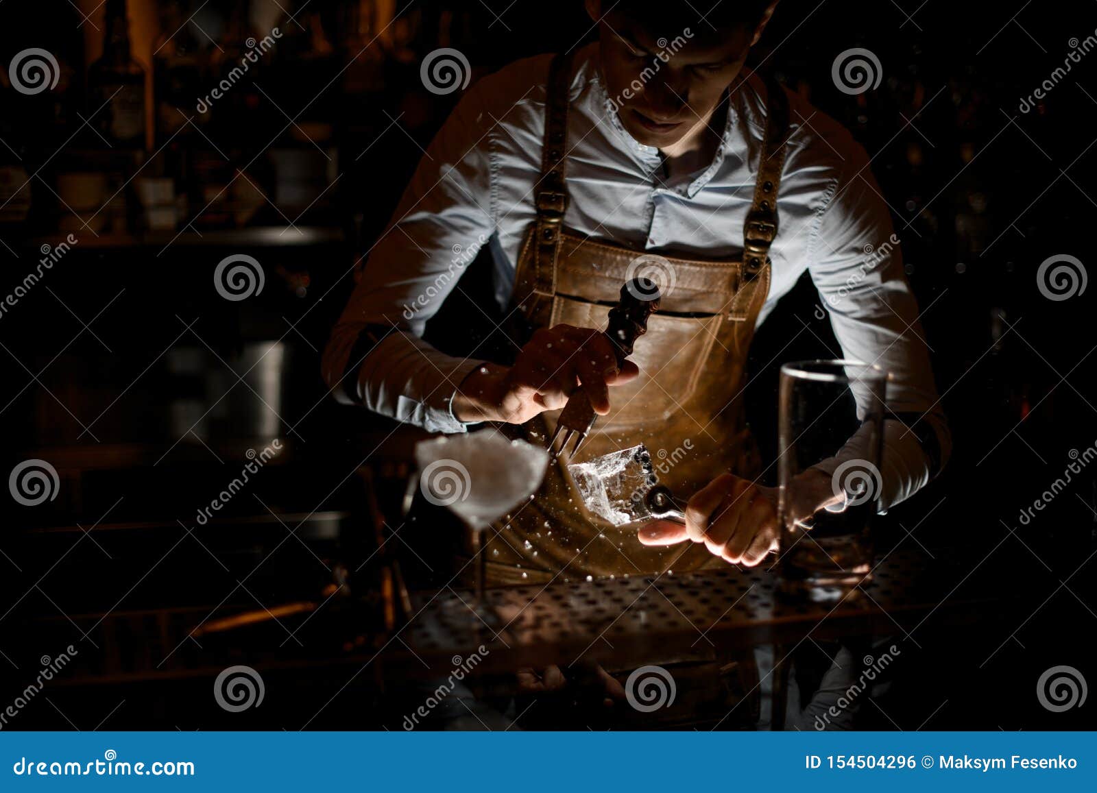 Bartender Crushes the Ice Cube with Picker Stock Photo - Image of ...